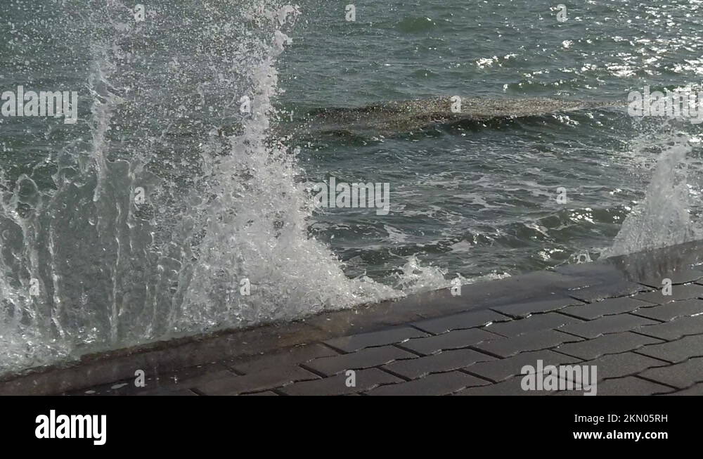 Wave breaking against a seawall Stock Videos & Footage - HD and 4K ...