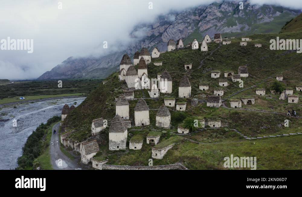 Russia, Caucasus. Ancient city of towers on hills near seething ...