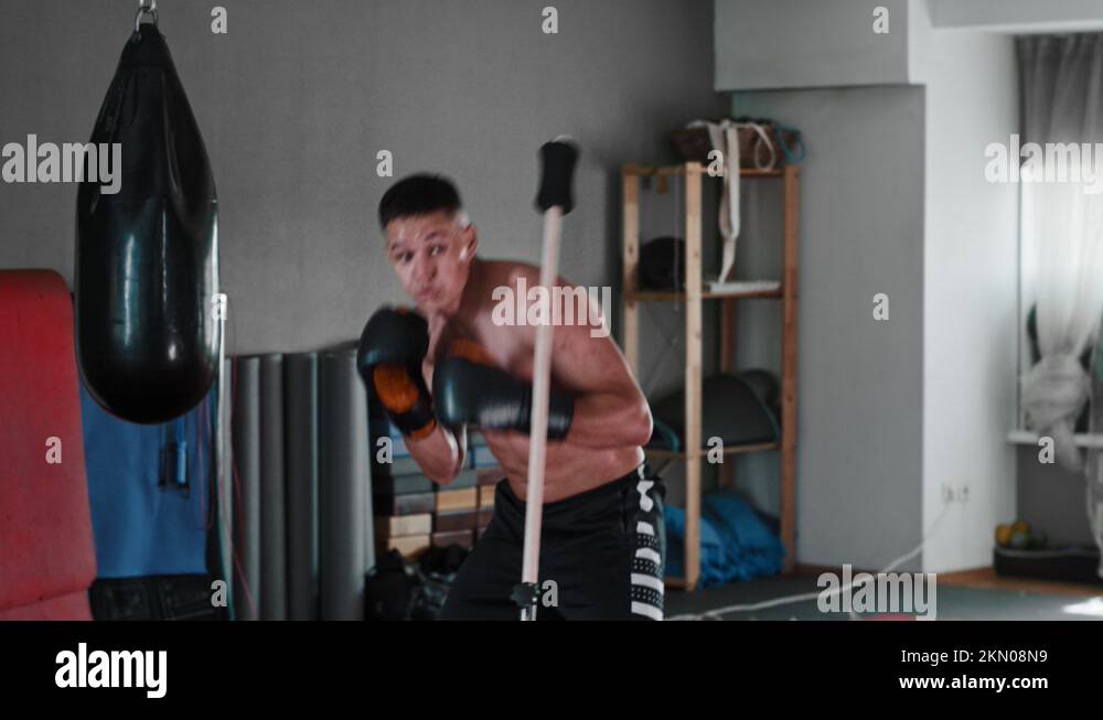 Shirtless sweaty young man boxer training to dodge Stock Video Footage ...