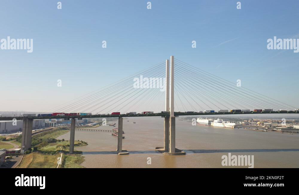 Pylons and cables supporting tall bridge above river Stock Video ...