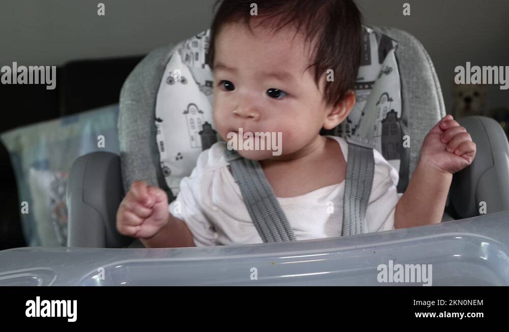 7 month old Cute Little Asian Chinese Baby Eating His Dinner. 4k. Child ...