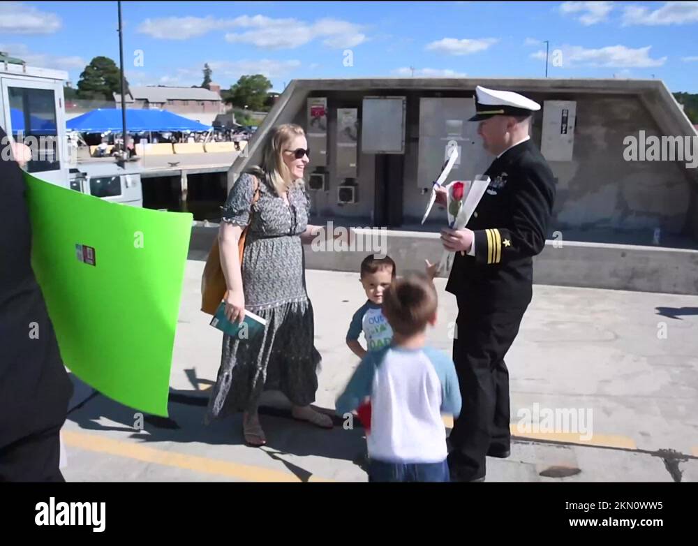 Sailor embraces family on returning home from U.S. Navy submarine USS ...