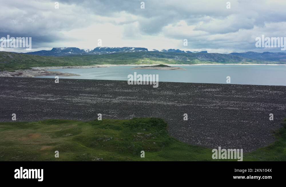 Aerial overview showing massive Sysen-dam Hardangervidda Norway and ...