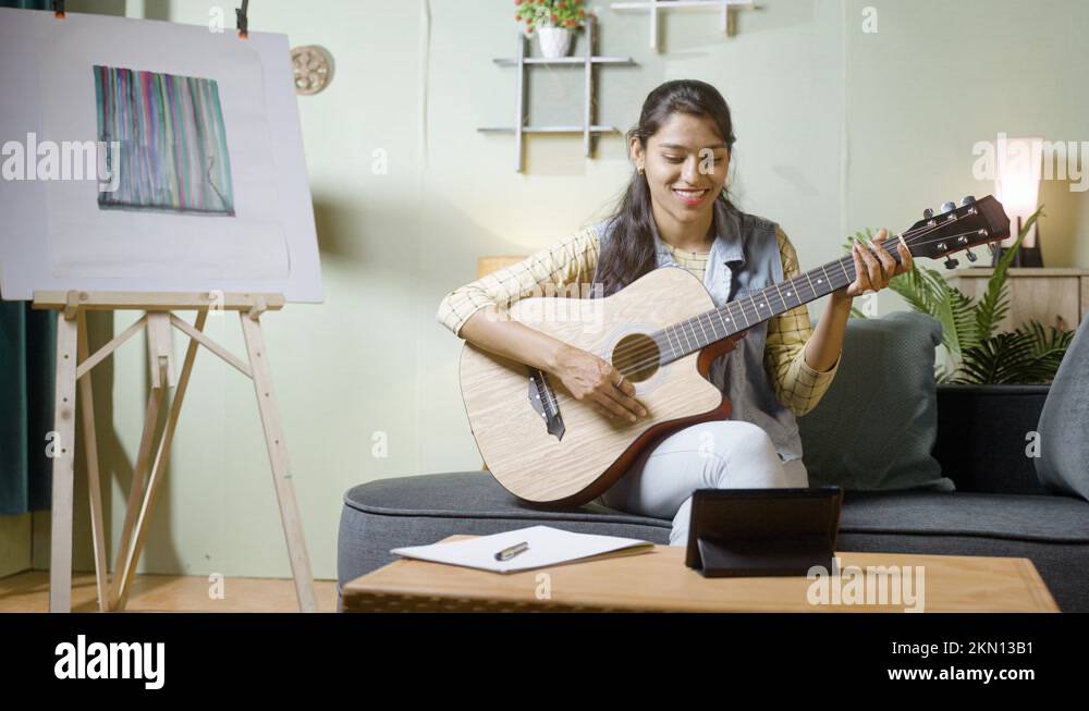 Young girl teaching the guitar Stock Videos & Footage - HD and 4K Video Clips - Alamy