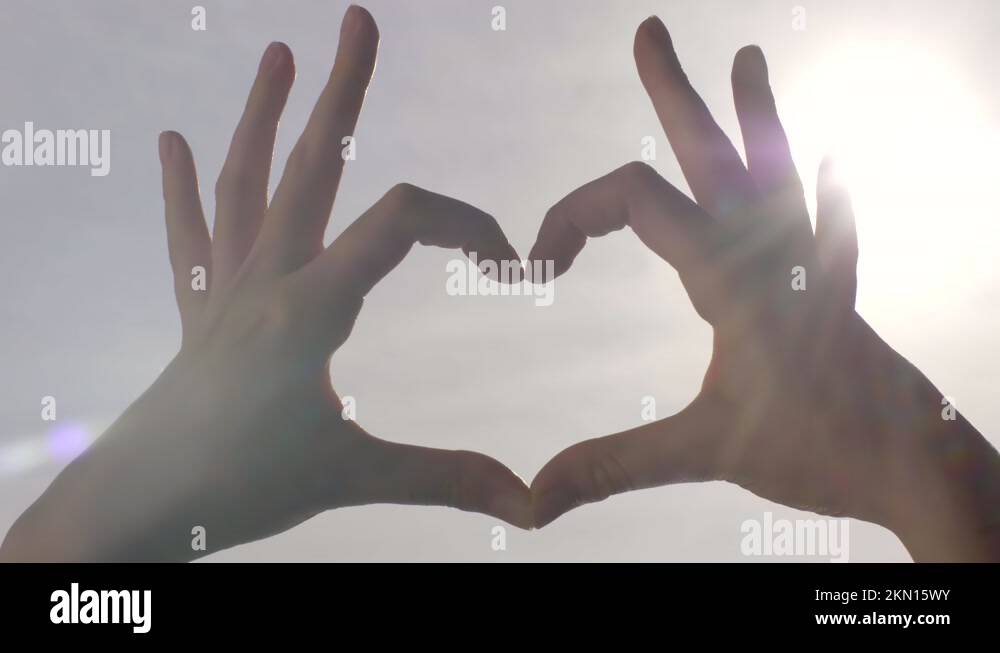 Sun through heart Stock Videos & Footage - HD and 4K Video Clips - Alamy