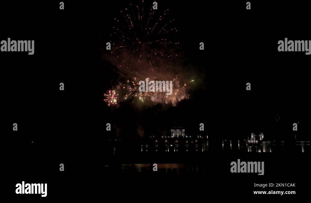 Real fireworks background shining fireworks with bokeh lights in the ...