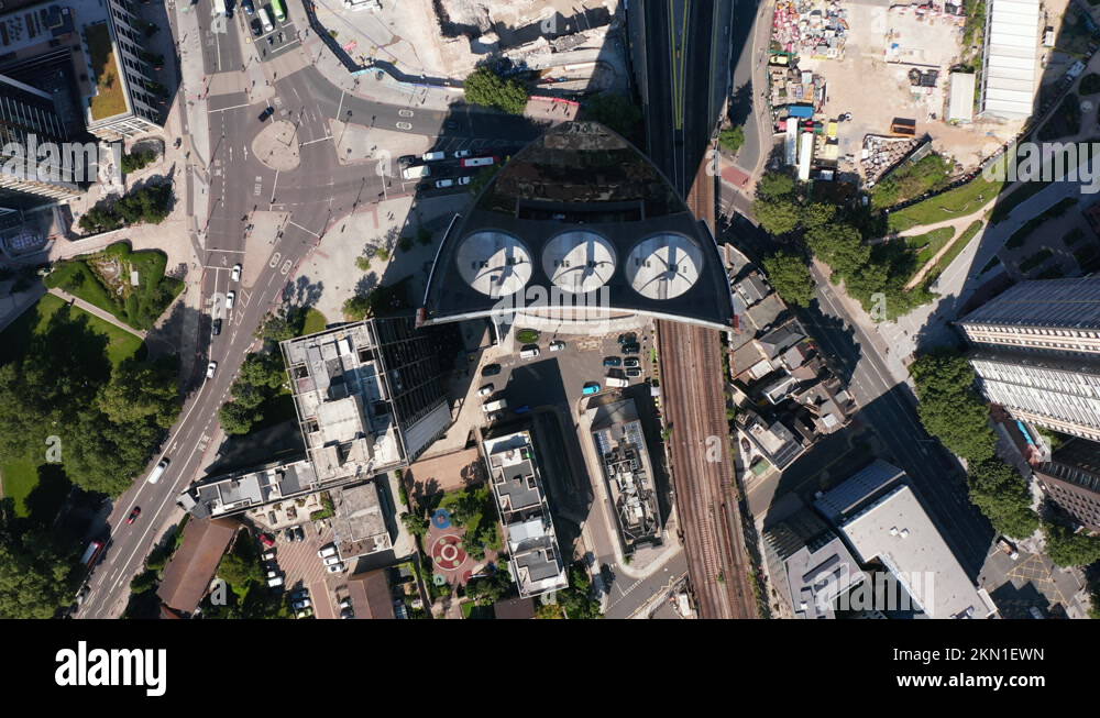 Aerial birds eye overhead top down ascending view of Strata apartment ...