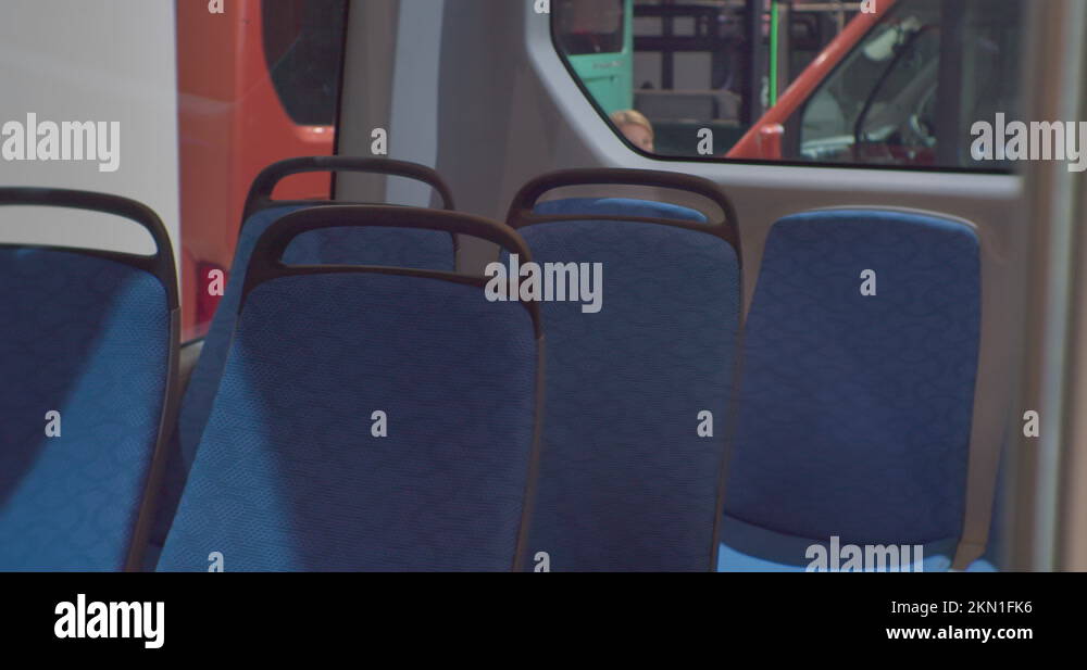 empty seats in the interior of a modern bus. close-up Stock Video ...