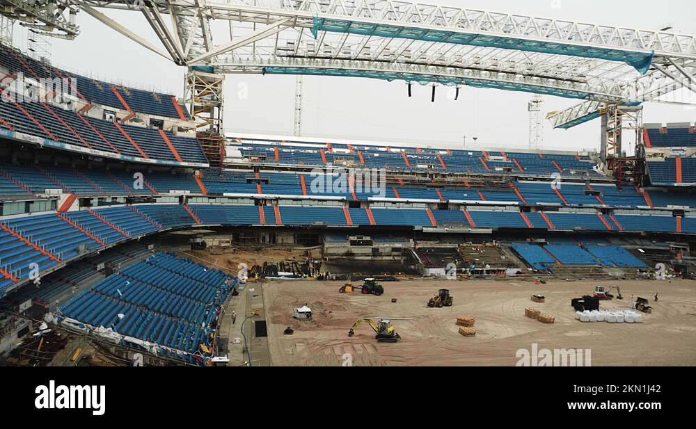 Loader Equipment Working On The Ground Of A Football Stadium Under ...