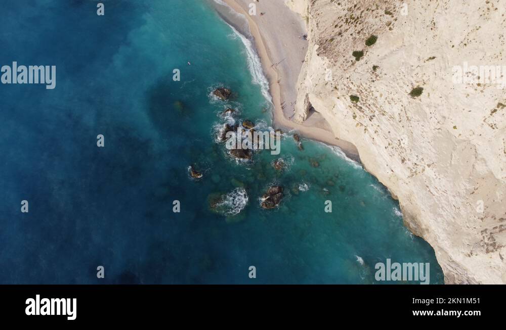 Idyllic beach destination with azure blue water next to precipitous ...