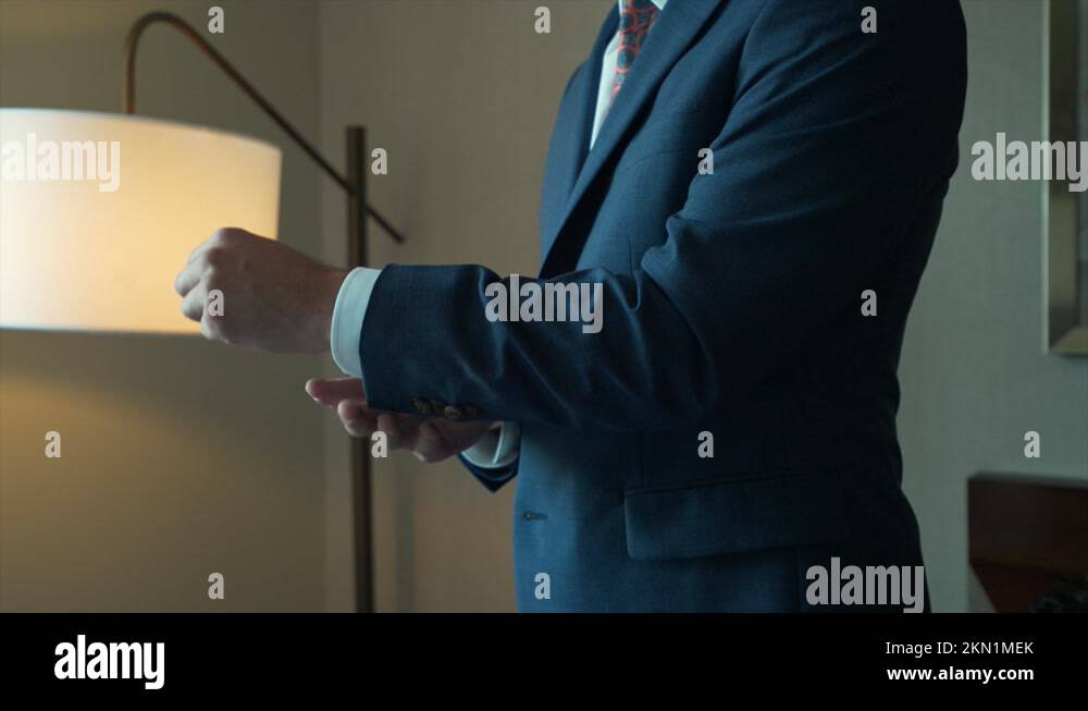 Man adjusting cuffs Stock Videos & Footage - HD and 4K Video Clips - Alamy