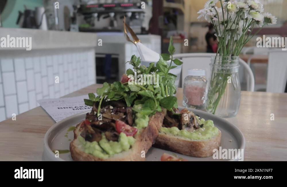 Avocado toast restaurant Stock Videos & Footage - HD and 4K Video Clips ...