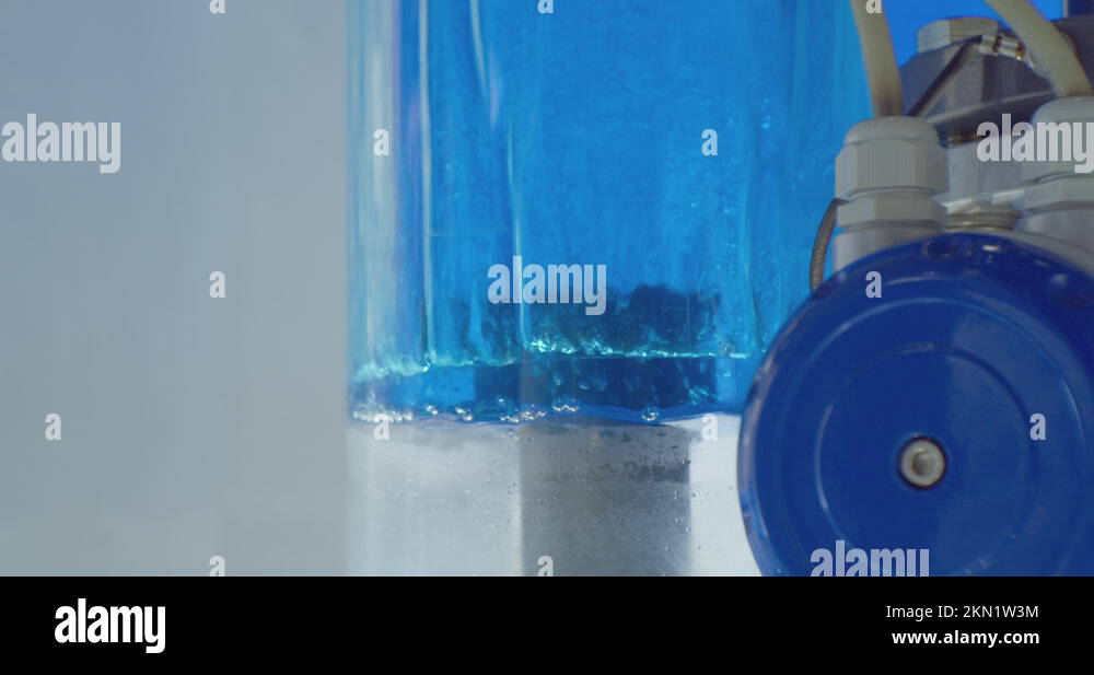 modern pump equipment.beautifully illuminated liquid is pumped in a ...