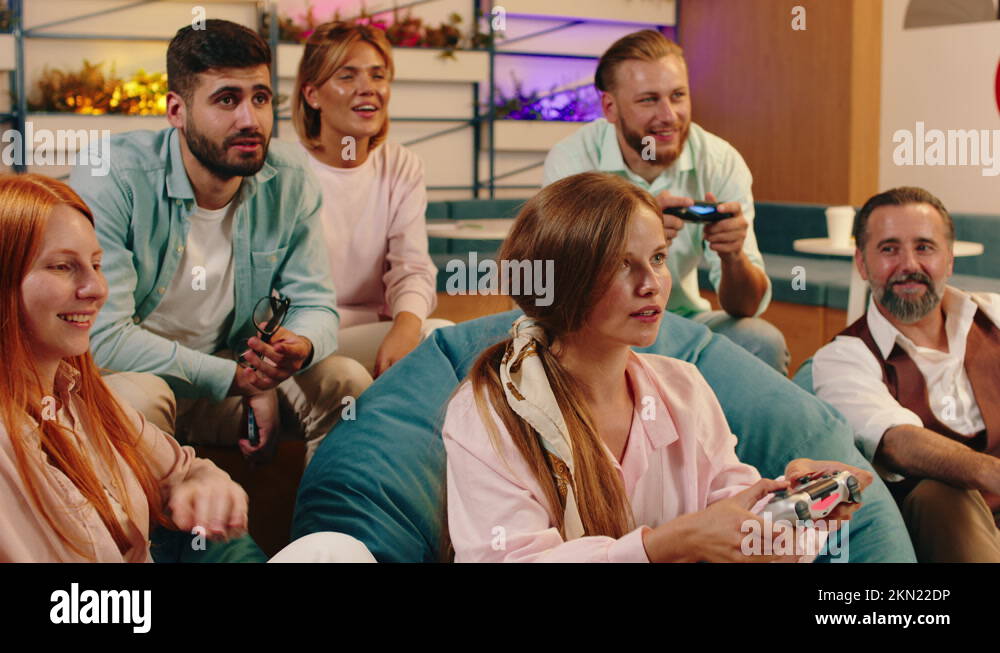 Six people are playing against eachother in video games and they are ...