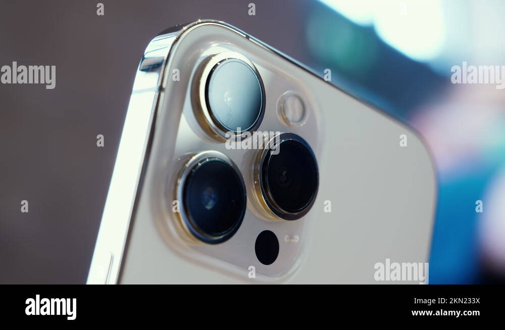Rear view of triple improved camera array on iPhone 13 Pro at the Apple ...