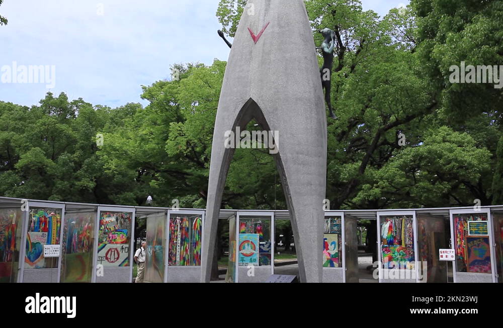 At the statue of the atomic bomb memorial Stock Video Footage - Alamy