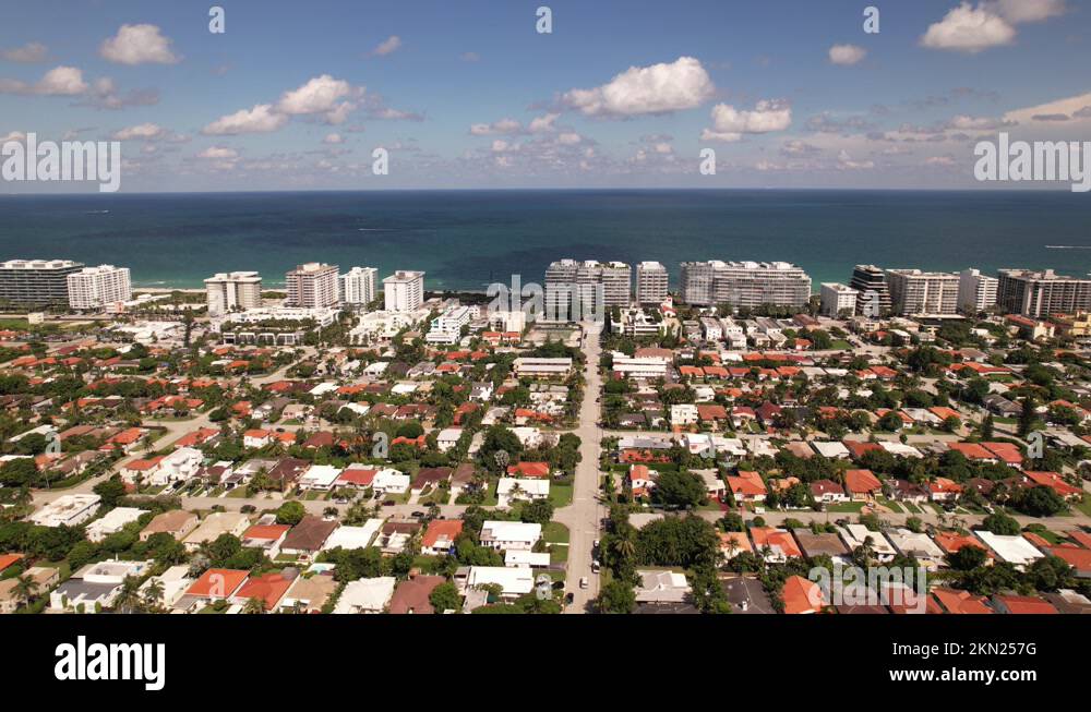 5k footage Surfside Florida flyby side view. Scene shows Atlantic Ocean ...