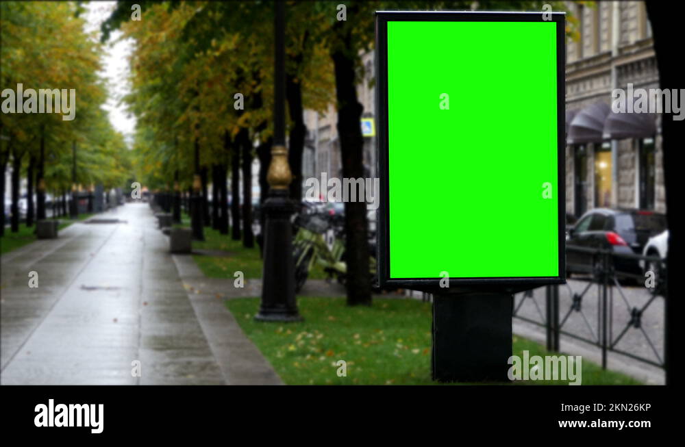 Billboard green screen on a city street Stock Video Footage - Alamy