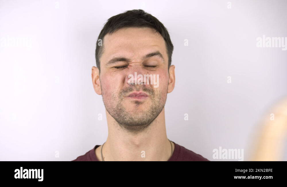 A young attractive guy gets a slap in the face from his girlfriend ...