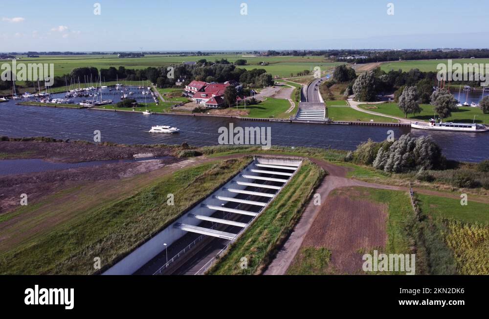 Aquaduct structure connecting a lake over a highway like a water-bridge ...