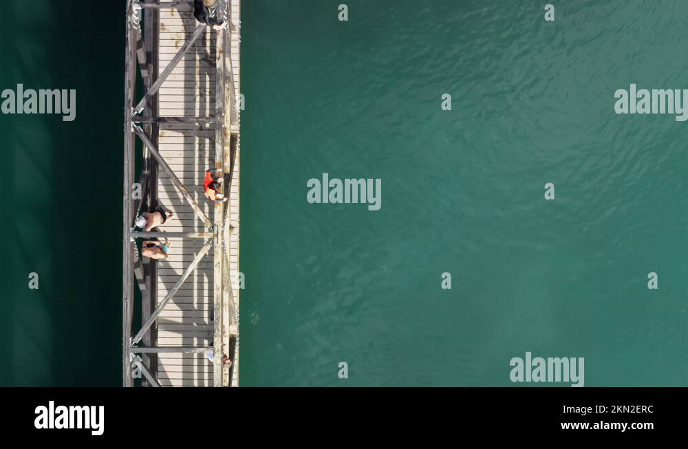 Drone footage of a man jumping off the bridge Stock Video Footage - Alamy