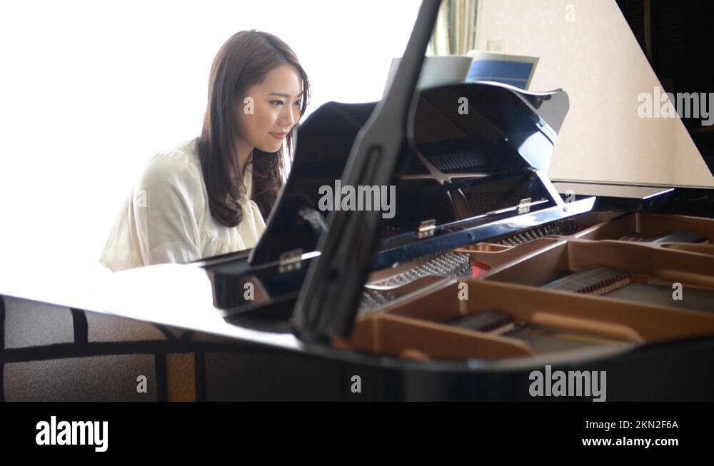 Woman Playing Grand Piano Stock Video Footage Alamy