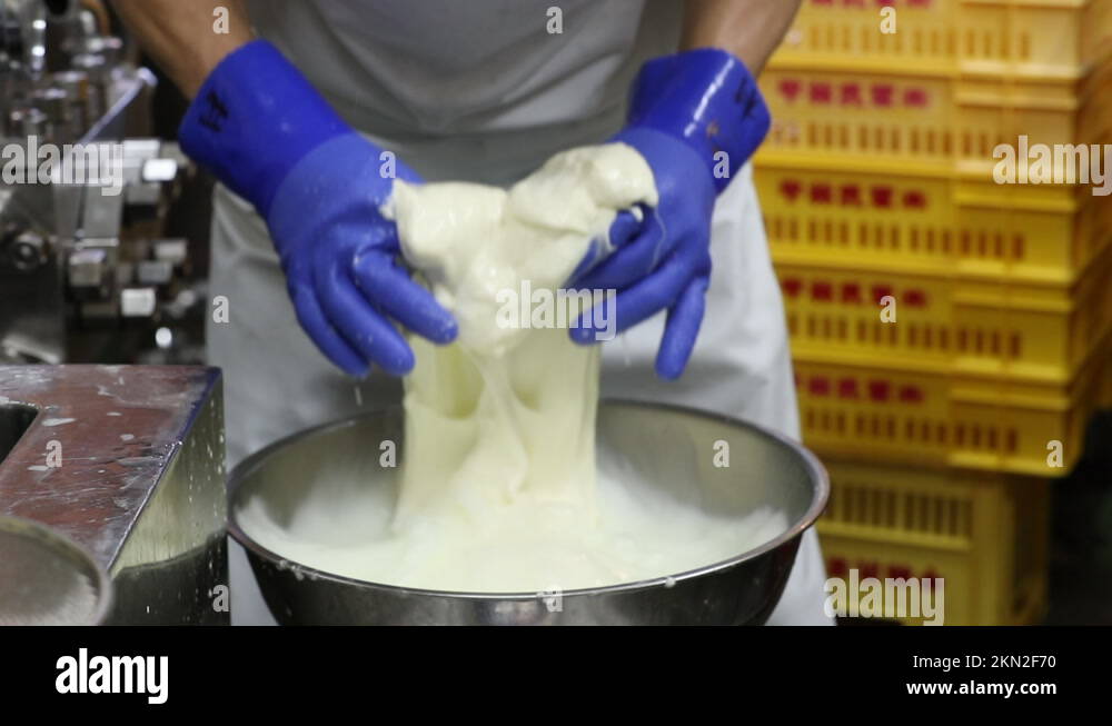 How to mold cheese Stock Video Footage - Alamy