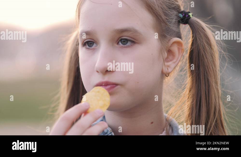 School girl eating chips Stock Videos & Footage - HD and 4K Video Clips ...