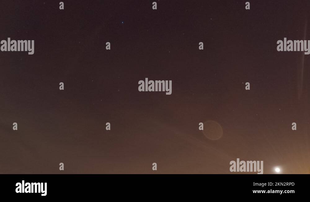 Bright moon light ray n lens flare effect in starry star night sky ...