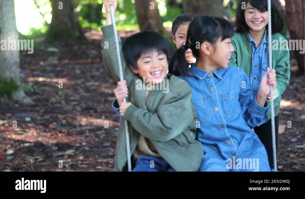 3 children playing Stock Videos & Footage - HD and 4K Video Clips - Alamy