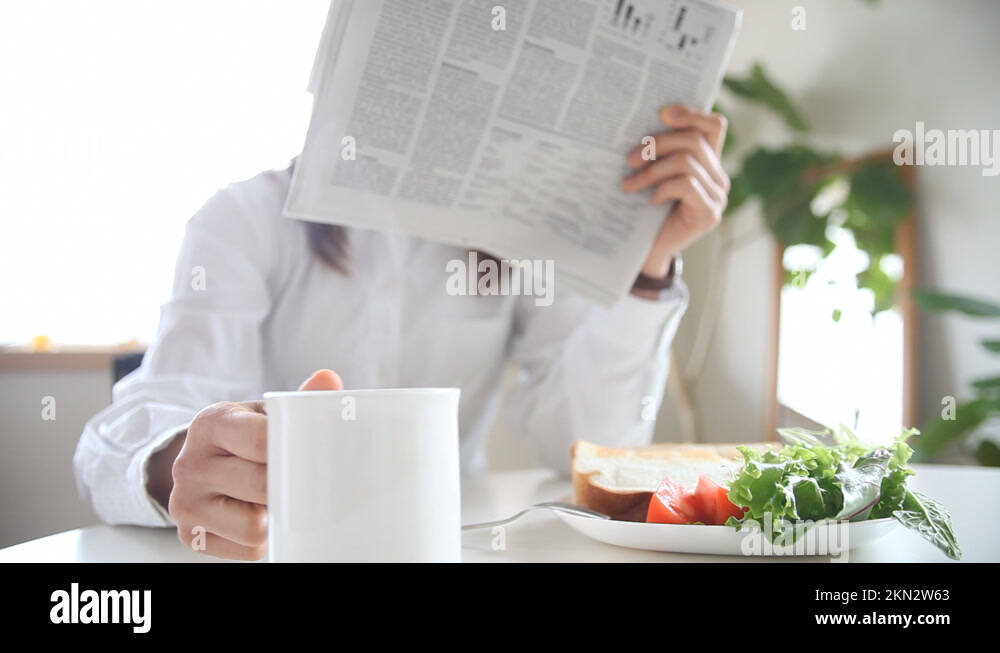 Newspaper reading breakfast Stock Videos & Footage - HD and 4K Video ...