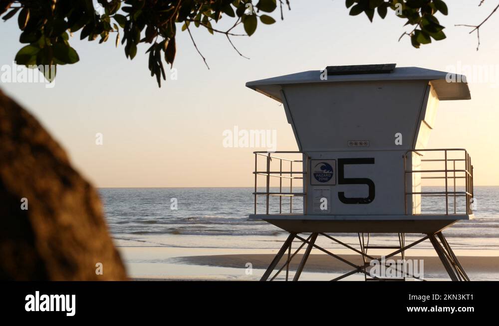 Lifeguard watch tower sunny sunset beach. Watchtower hut, pacific ocean ...