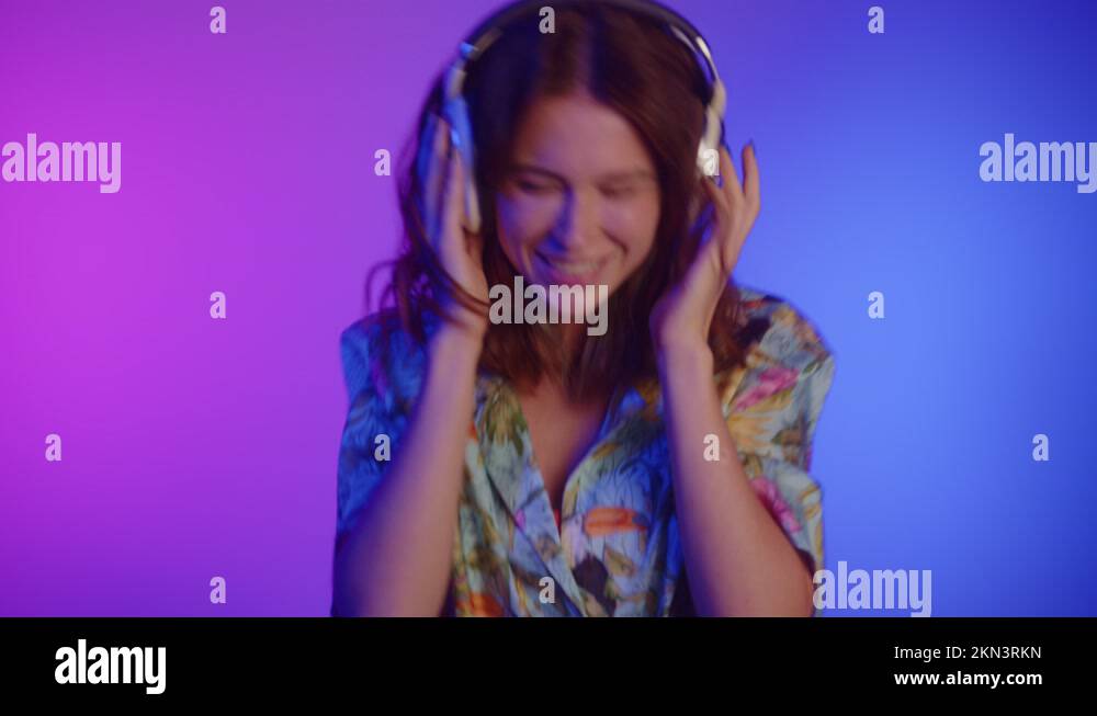 Girl Shaking Her Head From Side To Side, Jumping And Dancing While ...