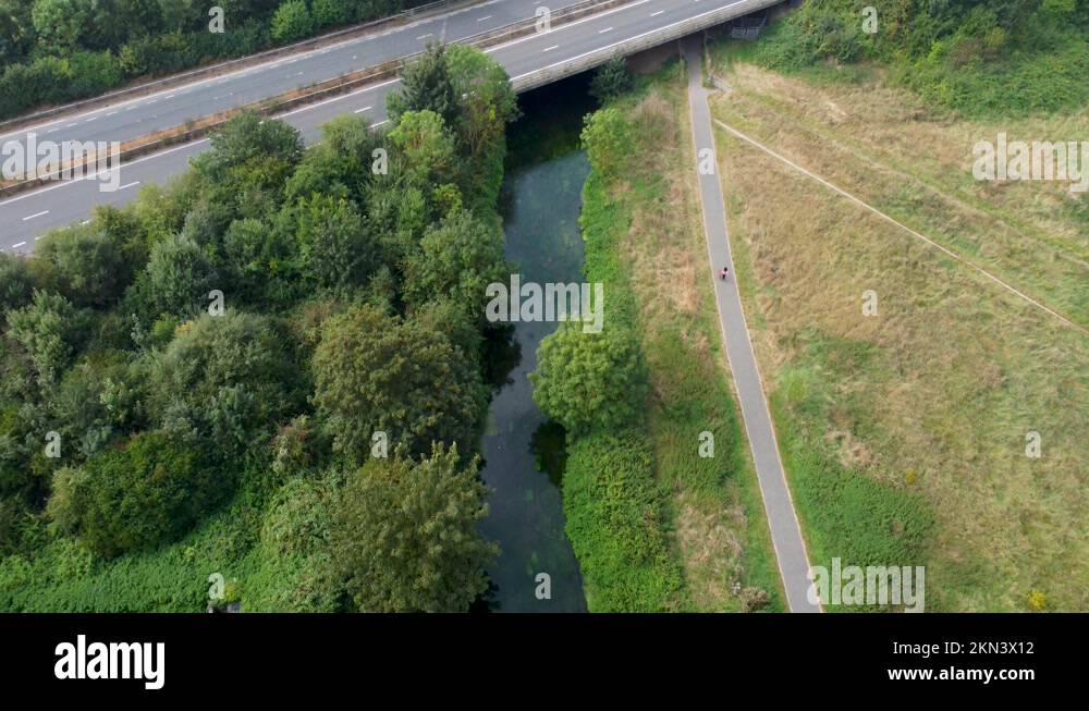 Cycle Path Next To Waterway With A2 Dual Carriageway Overhead. Aerial ...