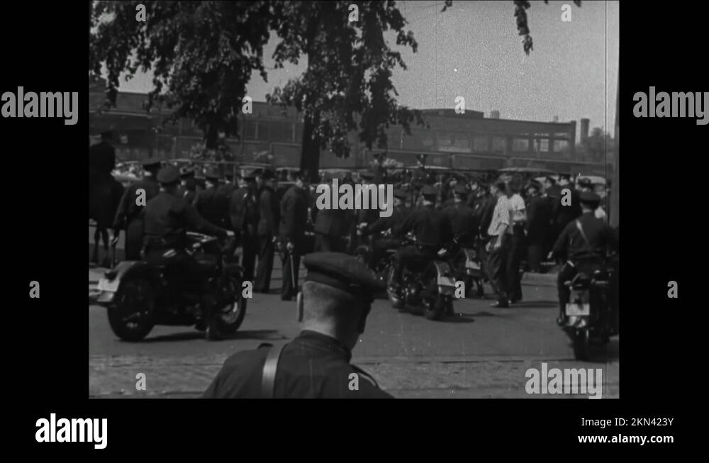 1940s: Group of police by picket line. Police on horseback, picket line ...