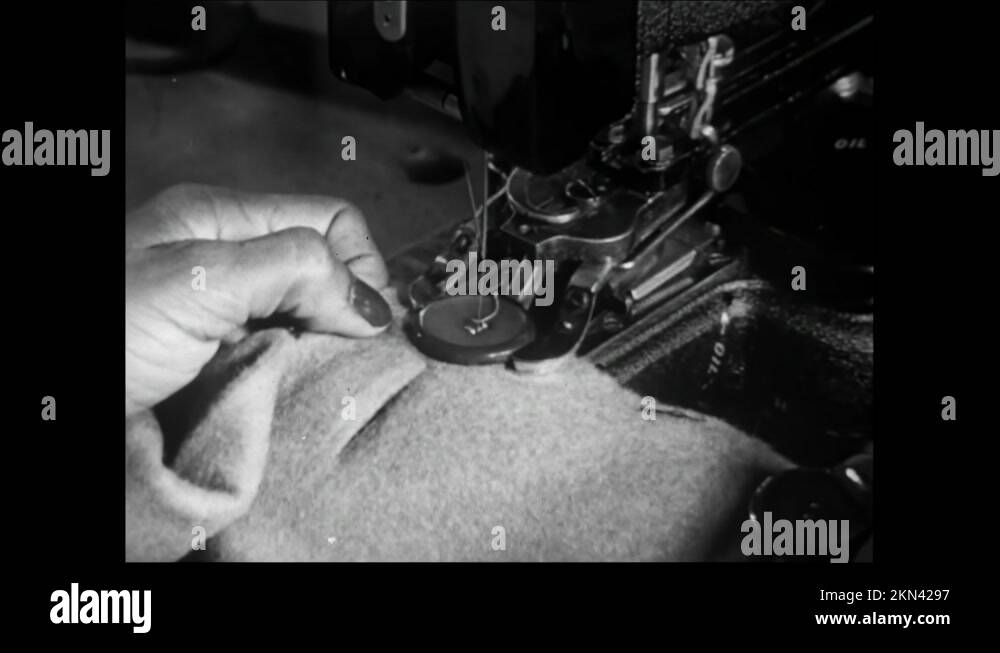 1950s: Hands put fabric in a punch. Sewing machine attaching a button ...
