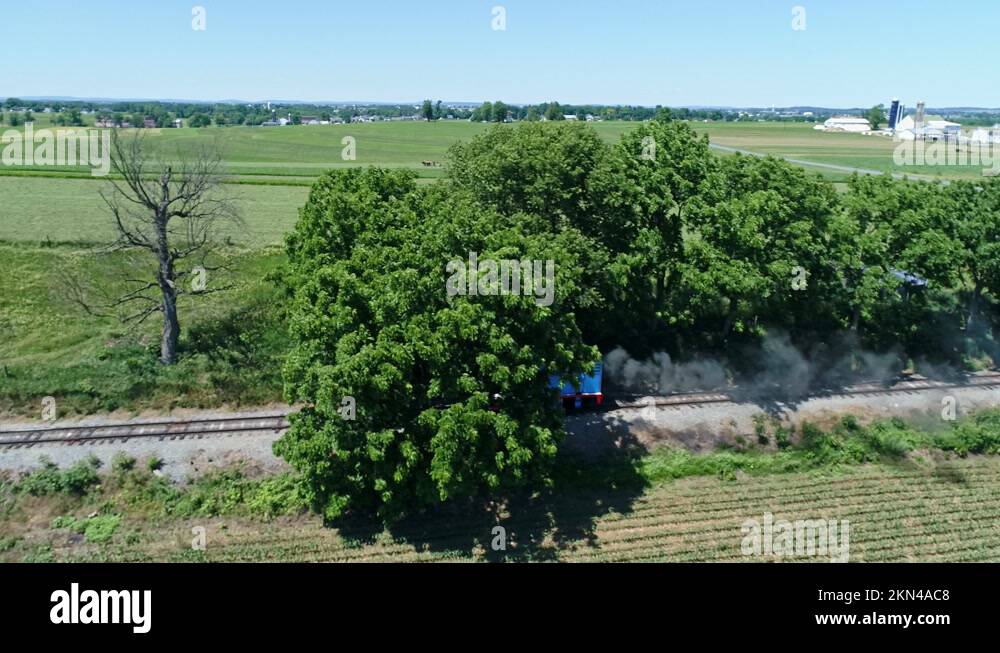 An Aerial View of Thomas the Tank Engine Blowing Smoke Arriving by It's ...