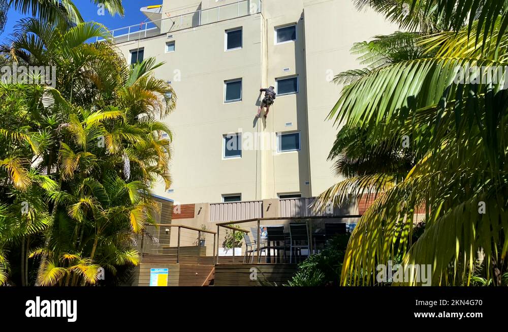 Man painting facade high rise building Stock Videos & Footage - HD and ...