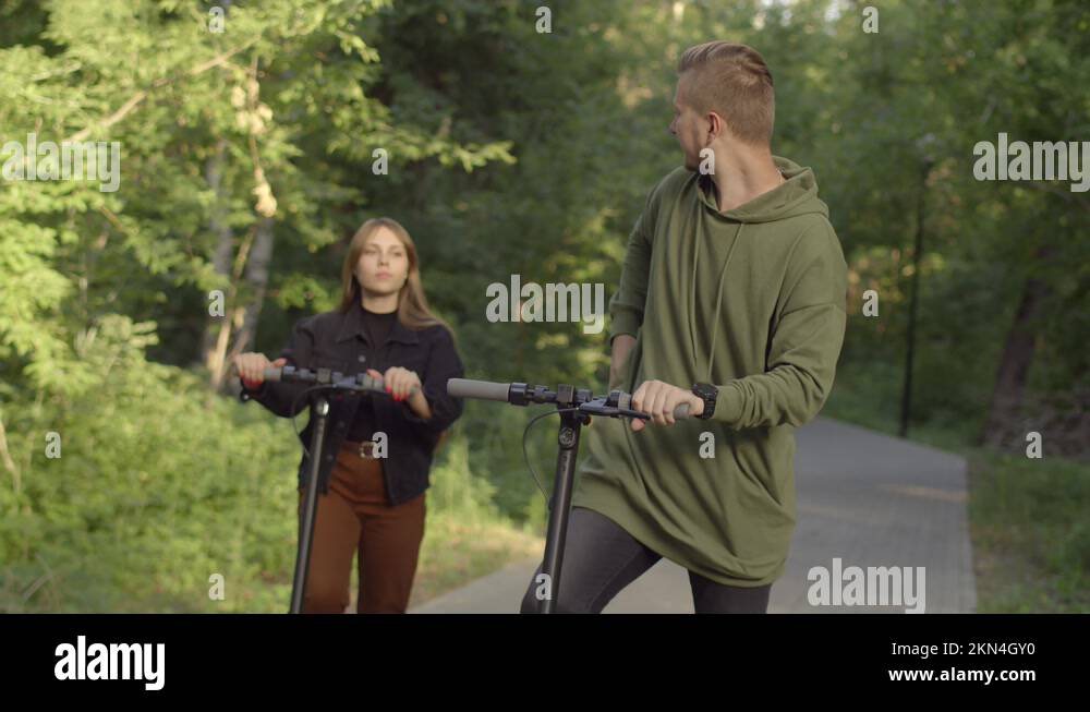 Man checks route on his phone and leaves with his girlfriend on ...