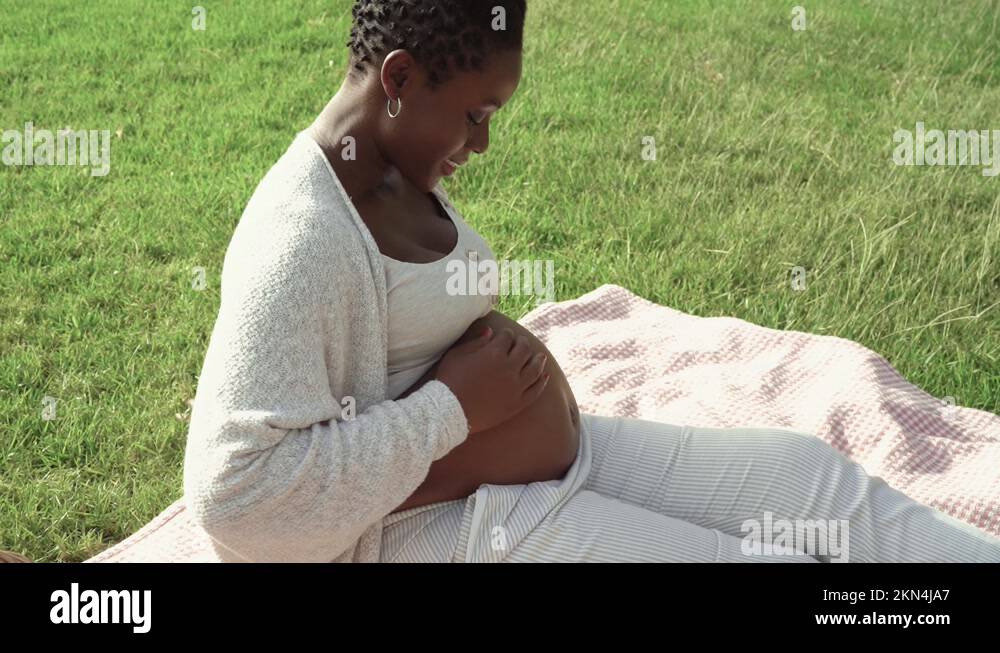 Pregnancy bump african woman Stock Videos & Footage - HD and 4K Video ...
