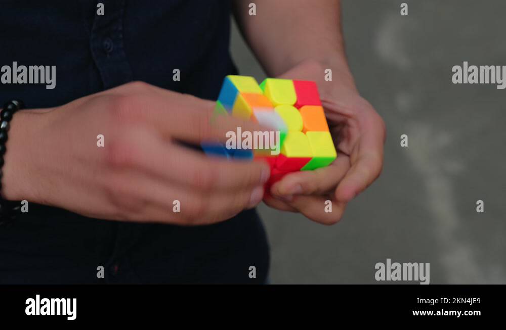 Kiev, Ukraine - October 01, 2021: Rubik's cube in the hands of a man ...