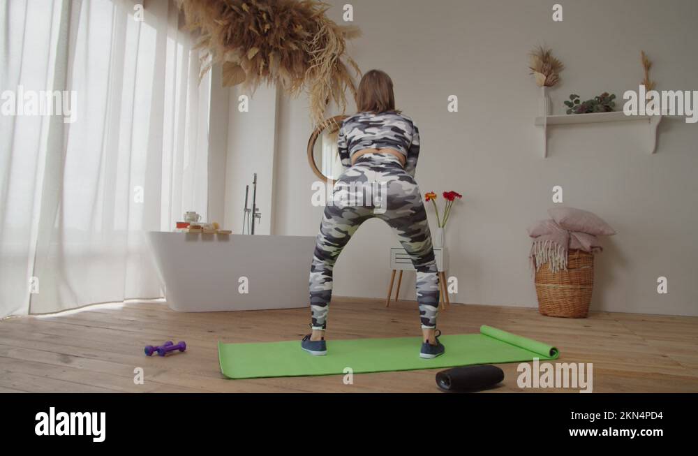 Woman squat exercise Stock Videos & Footage - HD and 4K Video Clips - Alamy