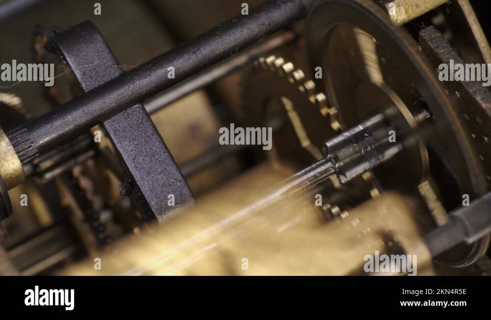 Internal clock mechanism. Impact hammers driven by clockwork with audio ...
