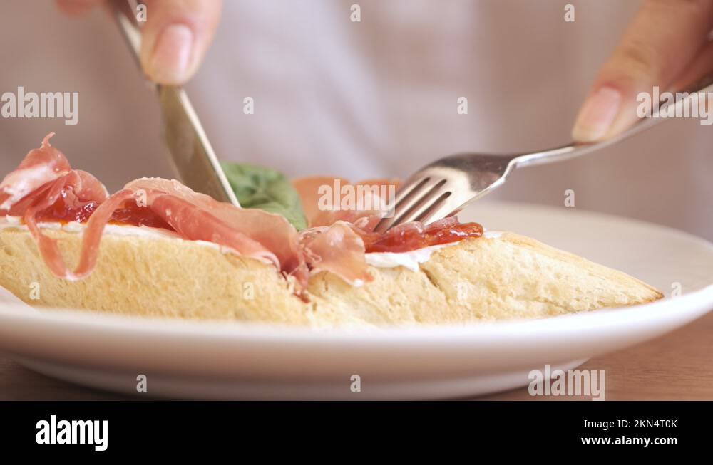 Woman eating ham sandwich Stock Videos & Footage - HD and 4K Video ...