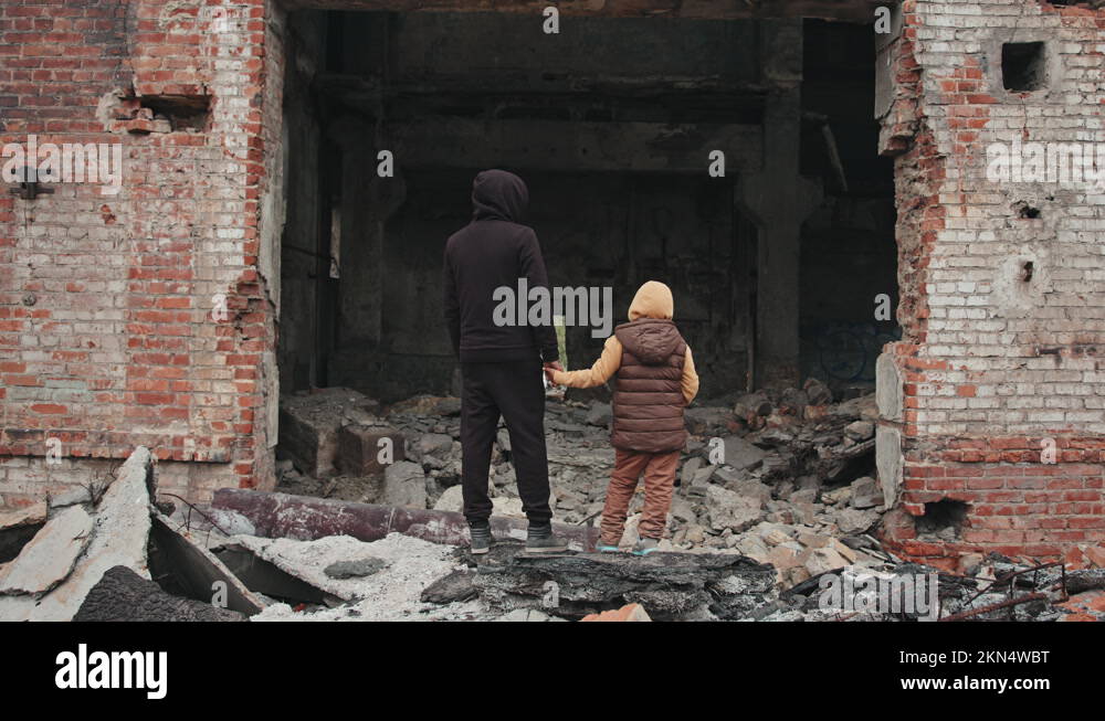 Father and Daughter Looking at Their Demolished House Stock Video ...