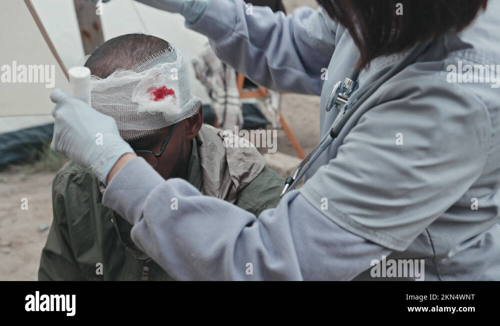 Giving first aid Stock Videos & Footage - HD and 4K Video Clips - Alamy