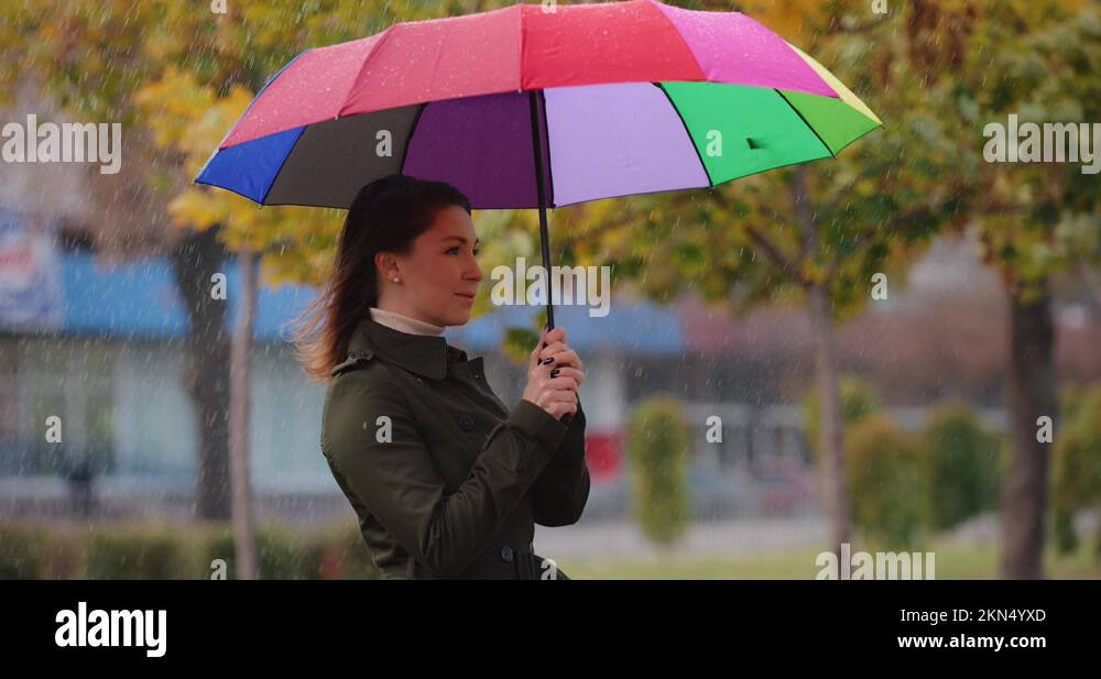 Hiding under umbrella Stock Videos & Footage - HD and 4K Video Clips ...