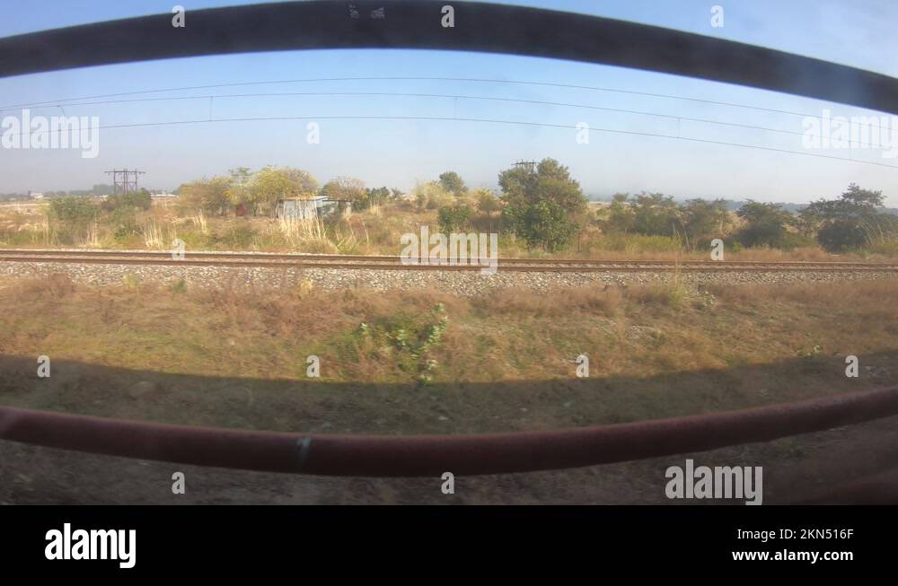 Train window leaning out point of view during long distance train ride ...