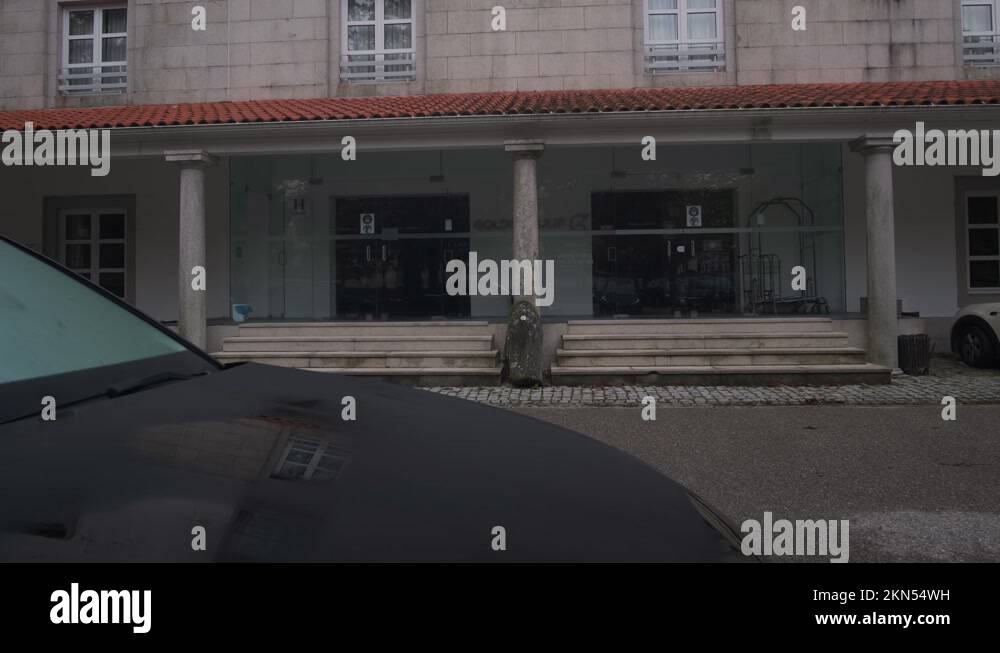 Entrance of Golden Tulip Caramulo hotel and spa. Tilt-up reveal Stock ...