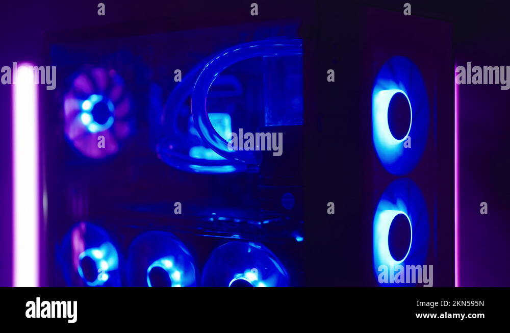 Reveal gaming RGB PC with water cooling tubes surrounded with neon ...